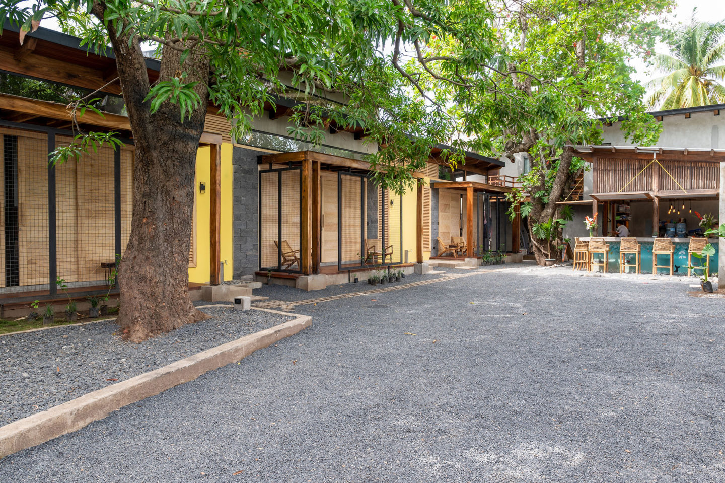 010-Tree-Suite-Exterior-View-of-porches-and-cafe-during-ISA-Nice | El ...